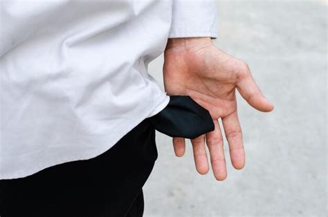 Premium Photo Midsection Of Man Showing Empty Pocket On Road