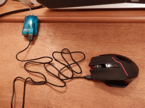Gaming Mouse Attached To The Computer Via The Usb Cable Provided Pen