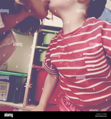 Mom And Son Kissing Stock Photo Alamy