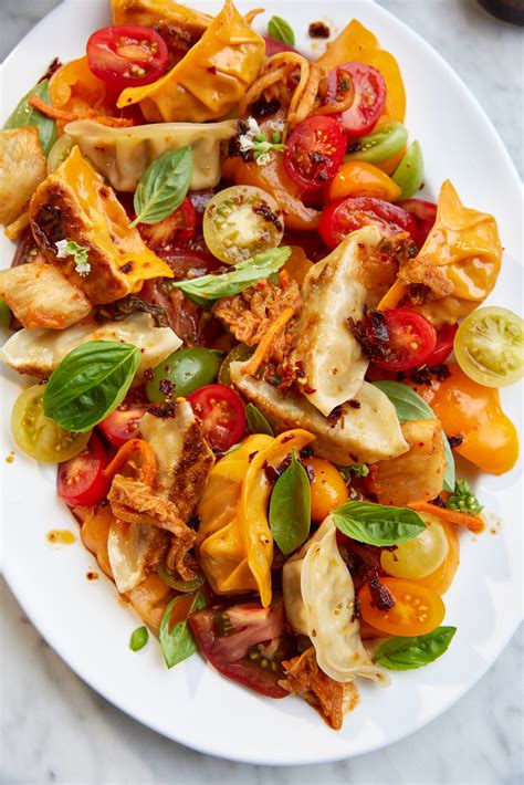 Tomato And Dumpling Salad With Kimchi And Zingy Sesame Vinaigrette The