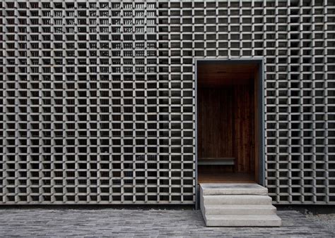 Bricks Give A Perforated Facade To Mountain Building By Li Xiaodong