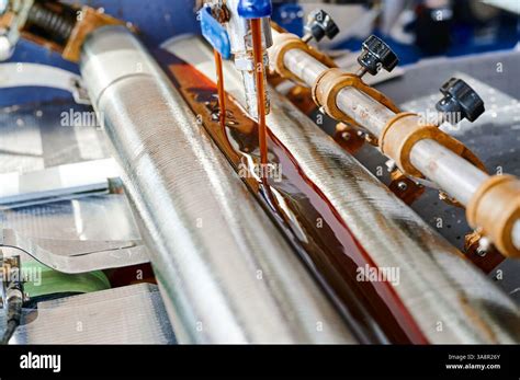 Efficient Glue Application With A Precision Machine Ensuring Top Quality Adhesion In