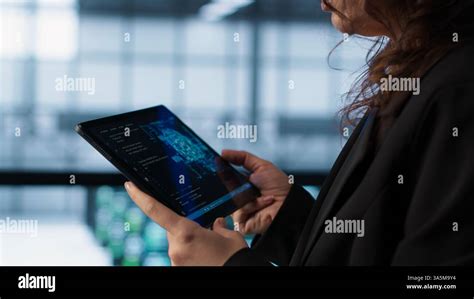 engineer in data center with tablet integrating ai driven automation