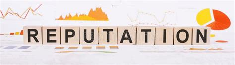 On A Light Background Graphs Diagrams And Wooden Cubes With The Word