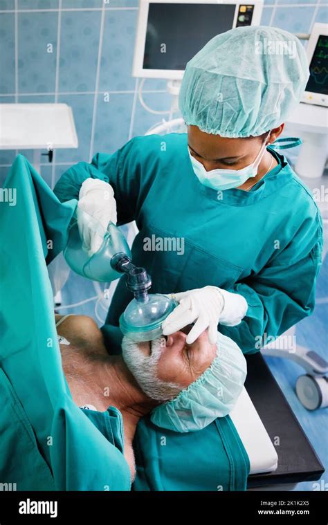 Anesthesiologist Doctor Anesthetized A Surgical Patient In Hospital