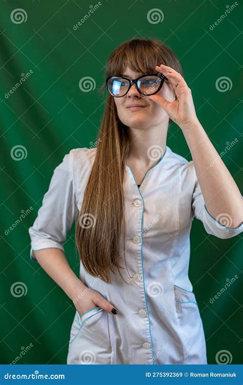 Attractive Female Nurse Or Doctor In Lab Coat Isolated Stock Image