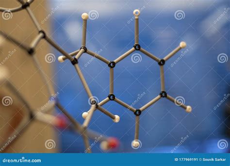 Assembly Of Comples Organic Molecule Structure With Blur Background For