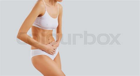 Woman In Underwear Holding Her Belly Stock Image Colourbox