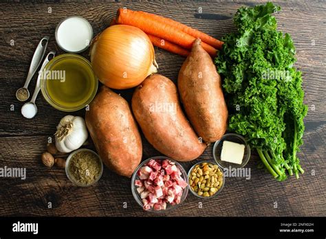Sweet Potato Chowder Ingredients On A Wood Table Raw Sweet Potatoes