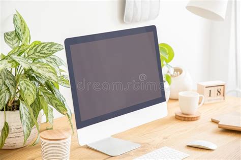 Black Desktop Computer With Mockup On Desk With Books And Plants In Work Area Interior Real