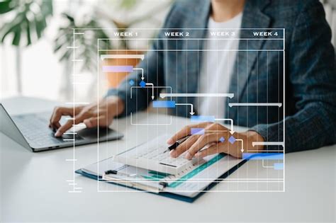 Premium Photo Project Manager Working And Update Tasks With