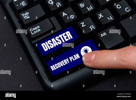 Hand Writing Sign Disaster Recovery Plan Internet Concept Having Backup Measures Against