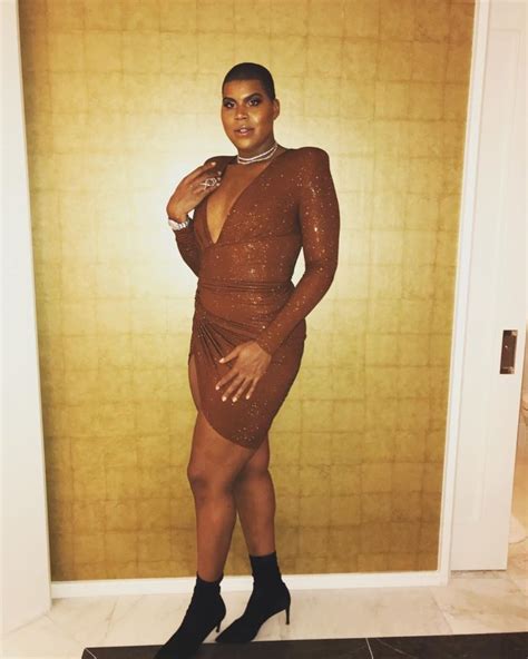 Magic Johnsons Son Shows His Figure In A Deep V Glitter Dress
