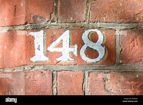 House Number Painted Sign On Wall Stock Photo Alamy