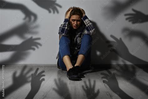 Paranoid Delusion Scared Woman Sitting Near Wall Shadows Of Hands