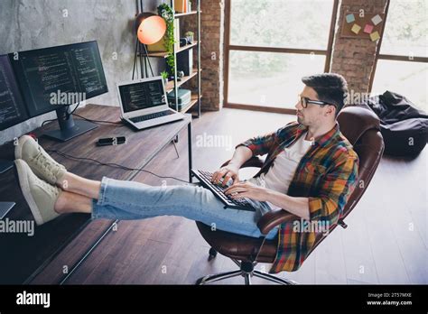 Full Length Profile Photo Of Skilled Front End Developer Sit Chair Legs Desk Keyboard Write Code