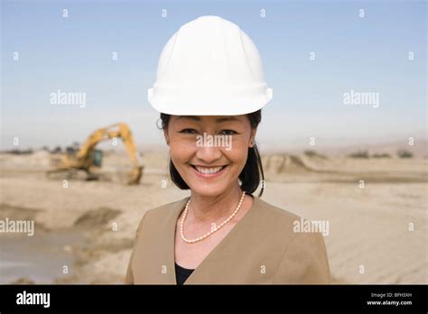 Female Surveyor On Construction Site Portrait Stock Photo Alamy