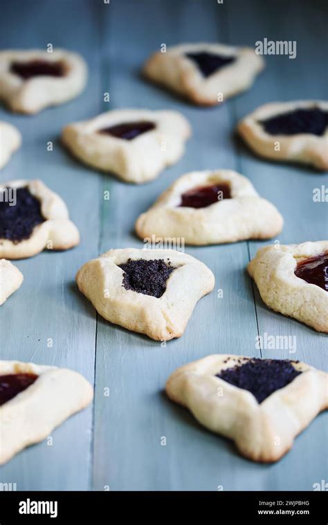 Variety Of Traditional Hamantaschen Cookies Filled With Mohn Paste