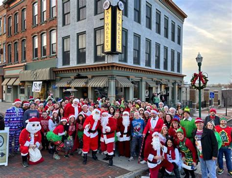 Holiday Festivities In Downtown Auburn Include Santa Con