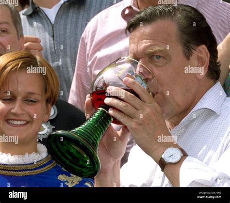 German Chancellor Gerhard Schroeder drinking a sip of wine in Unkel ...