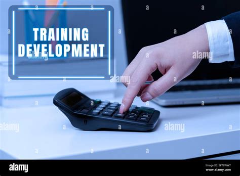 text sign showing training development word written on learn and
