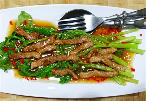 Kai Lan In Oyster Sauce Garnished With Beef Chef Reader