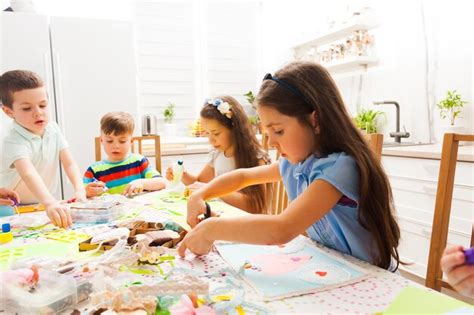 Premium Photo Women And Son On Table