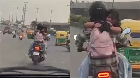 तेज रफ्तार और मोहब्बत की बारिश चलती बाइक पर दिखा रोमांस का चरचराता