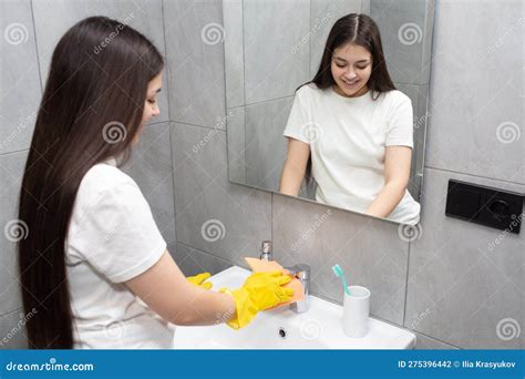 Young Girl Cleans The Bathroom Professional Cleaning Service For