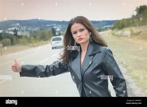 Hitch Hiker Woman Pretty Girl Windy Day Brunette Thumbing A Ride
