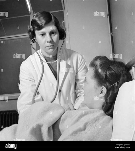 Dr Gibson Hill Examines Irene Stacey With A Stethoscope At Southmead Hospital In Bristol Prior