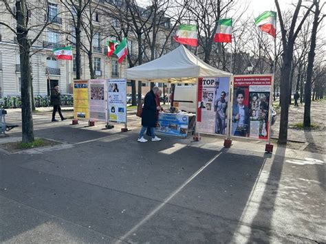 پاریس برگزاری میز کتاب و نمایش تصاویر شهیدان در همبستگی با قیام سراسری توسط هواداران سازمان