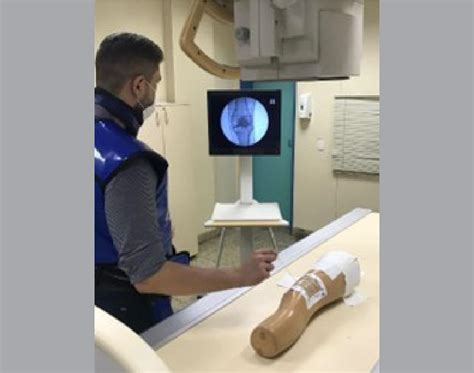 Orthopedist Positioning The Genicular Block Needles Under Fluoroscopy Download Scientific