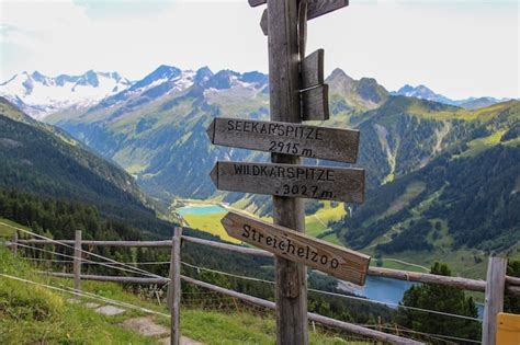 Premium Photo Information Sign On Mountain Against Sky