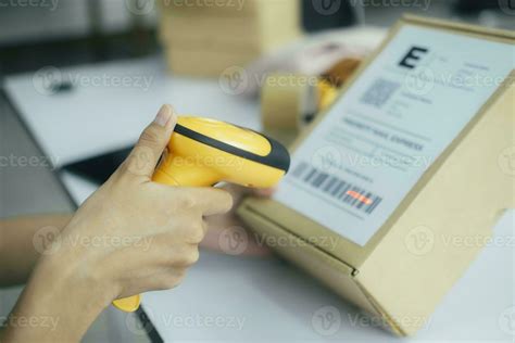 Scanning Parcel Barcode Before Shipment Stock Photo At Vecteezy