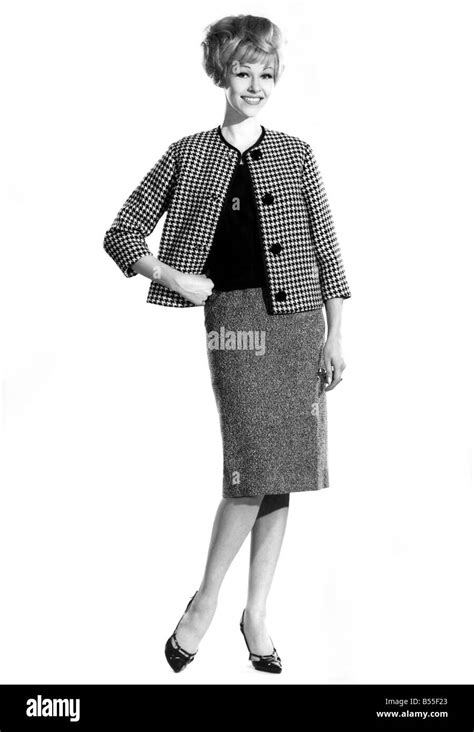 Model Jo Waring Wearing Skirt With Jacket And Top Standing With Hands On Hips September 1962
