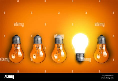 Idea Concept With Row Of Light Bulbs And Glowing Bulb Stock Photo Alamy