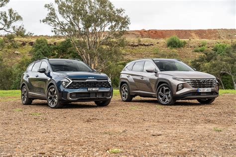 Hyundai Tucson Hybrid Vs Kia Sportage Hybrid 2024 Pansy Beatrice