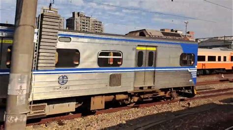 102次斗六發車經由山線開往七堵的pp自強號，4154次北湖發車經由宜蘭線開往瑞芳的銀綠色微笑號emu900型十輛一編組emu947區間車
