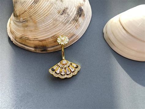 پیرسینگ ناف پر طاووس نگینی • گالری بدلیجات ترنج