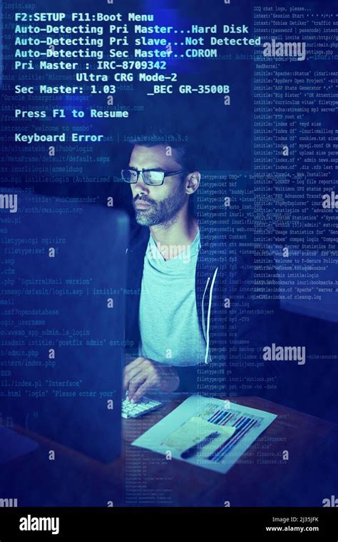 Hacking Is A Serious Business Shot Of A Focussed Computer Hacker Using