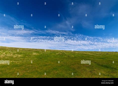 Blue Sky And Green Grass Fields At Seven Sisters National Park Stock