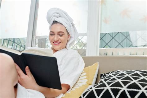 Premium Photo Happy Student Reading After Shower