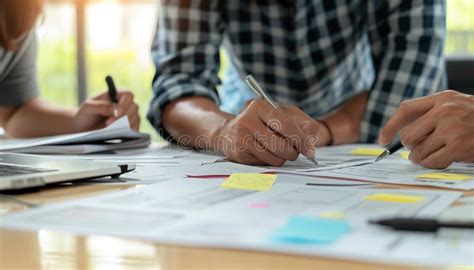 Close Up Ux Developer And Ui Designer Brainstorming Interface Wireframe Design Stock