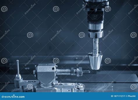 The 4 Axis Edm Machine Operation In The Light Blue Scene Stock Image