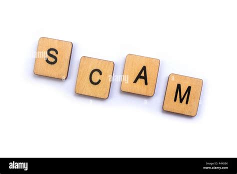 The Word SCAM Spelt With Wooden Letter Tiles Stock Photo Alamy