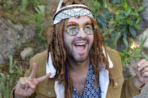 Hippie Man Showing Peace Hand Gesture Stock Photo Image Of Gesturing