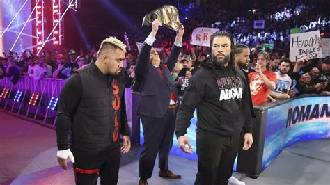 Roman Reigns Solo Sikoa And Jimmy Uso With Paul Heyman SmackDown New Year S Revolution Wwe
