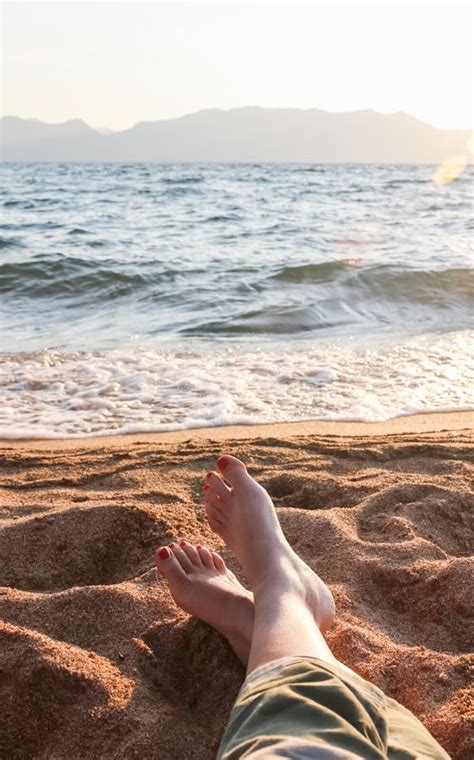 Closeup Of Womans Legs And Feet At The Beach Stock Image Image Of