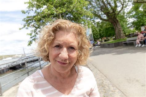 Portrait Of Attractive Senior Woman With Curly Hair Stock Image Image